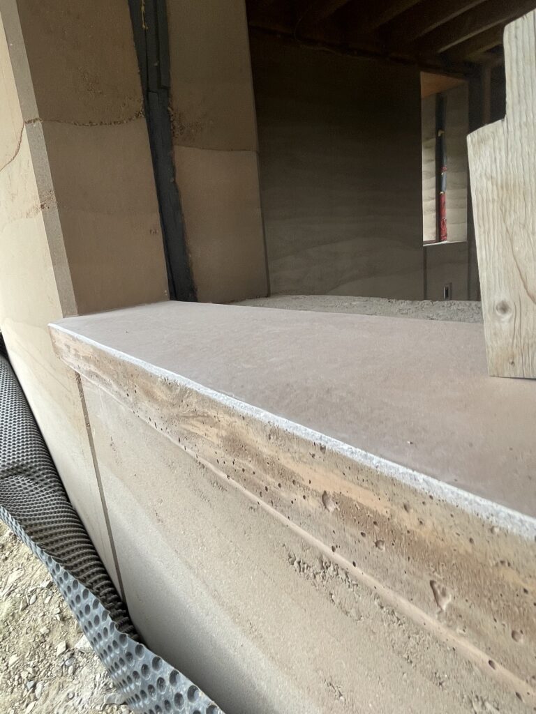 Unique and Stunning Rammed Earth Home with Concrete Sills